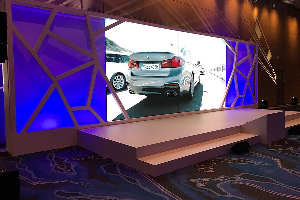 Event staging and audiovisual integration for booths